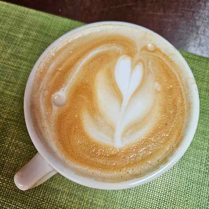 Latte art this pretty almost makes you feel guilty drinking it, almost, but not quite enough to stop you.