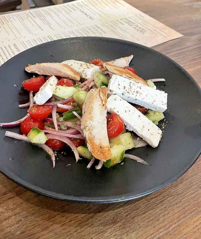 Greek salad with perfectly grilled chicken proves that not every meal needs a croissant, though it certainly wouldn't hurt to add one on the side.