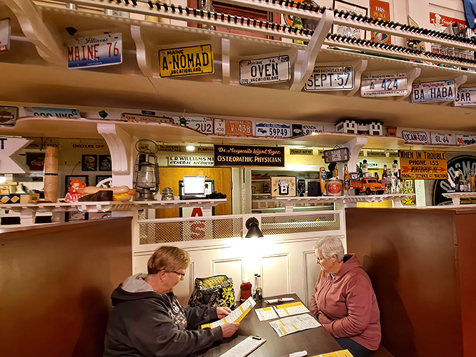 Regulars and tourists alike pore over menus beneath a canopy of vintage license plates &ndash; decisions, decisions!