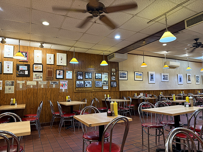 Wall decorations telling stories of decades past &ndash; framed memories and accolades creating a museum of delicious history.