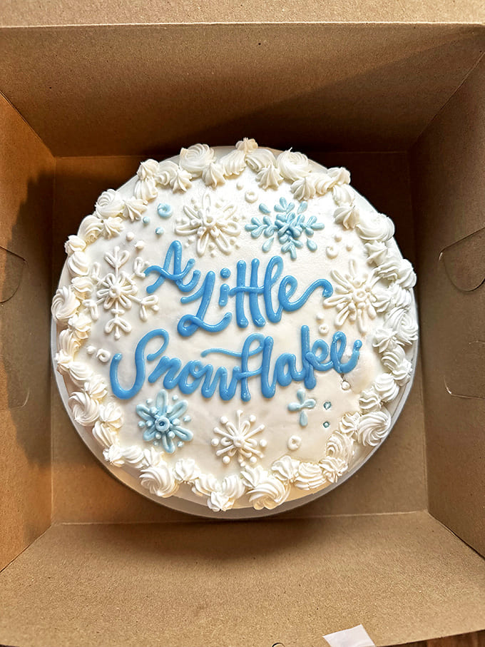 Cake: This snowflake-adorned beauty isn't just dessert; it's a blank canvas for life's celebrations, from "Happy Birthday" to "Sorry I Ate Your Leftovers."