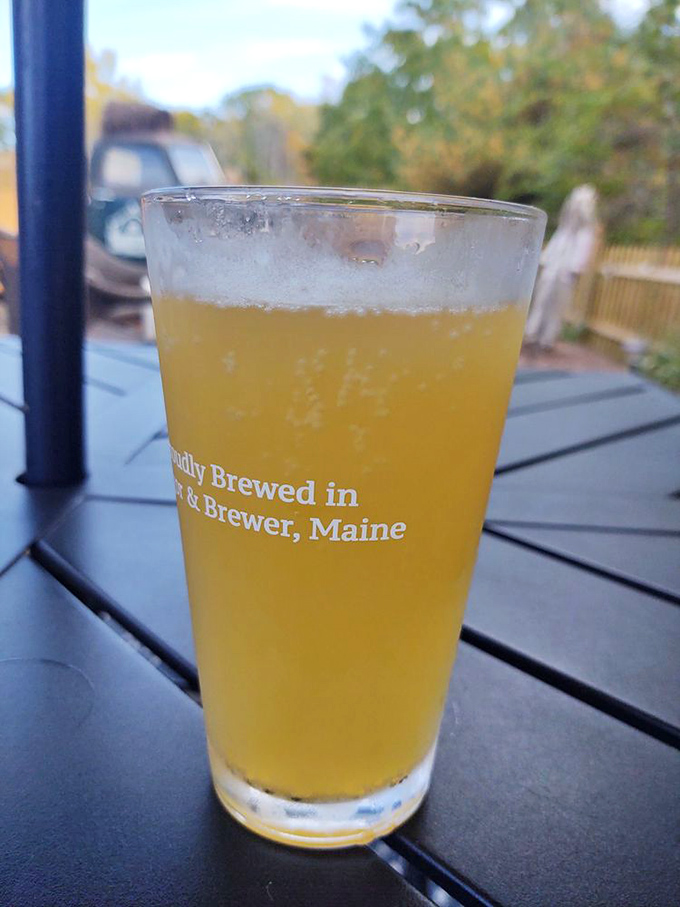 A golden glass of locally brewed DownEast Ale catches the light beautifully &ndash; the perfect companion to seafood and a reminder of Maine's craft brewing excellence.