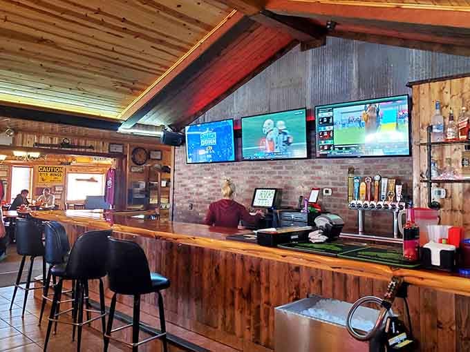 The bar area gleams with possibility, offering cold drinks and warm conversation in equal measure for thirsty patrons.