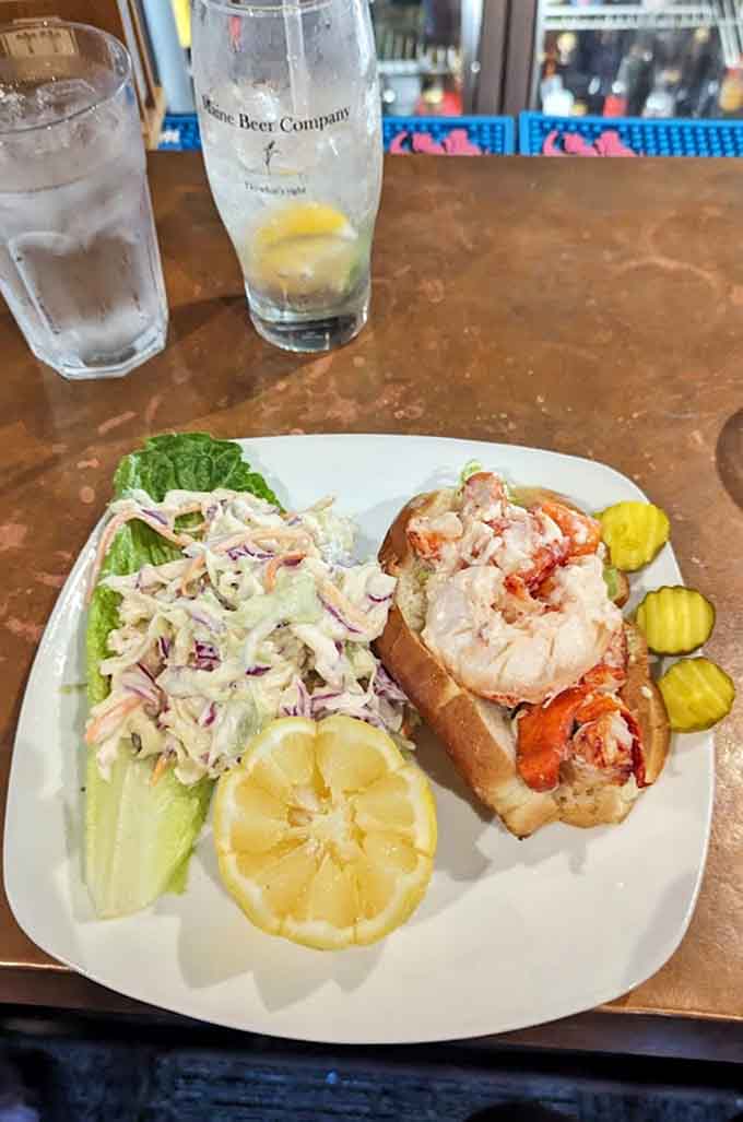 The lobster roll showcases Maine's finest, with sweet lobster meat nestled in a buttery toasted roll of dreams.