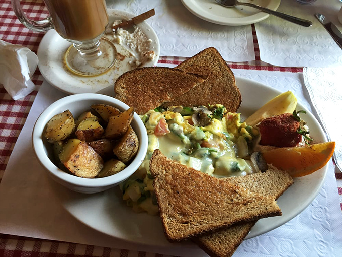 A veggie-packed breakfast that somehow makes healthy choices feel indulgent, with perfectly toasted bread and seasoned potatoes that could convert any sweet breakfast loyalist.