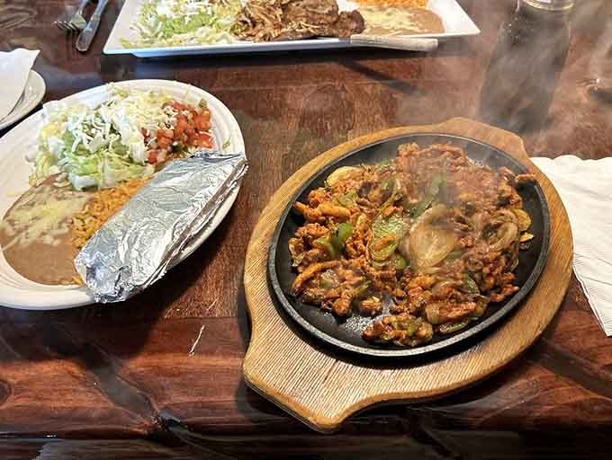 Fajitas arrive with all the drama they deserve, sizzling and steaming like a delicious Broadway production.