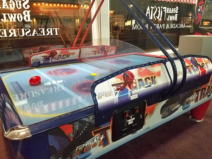 The air hockey table has witnessed countless family tournaments where parents mysteriously "let" their children win after decades of practice.