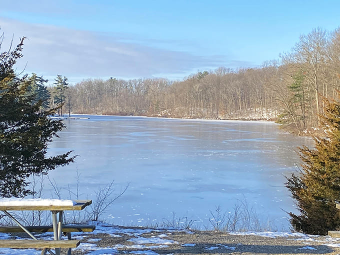 Winter transforms the local lake into a glistening playground where ice fishing enthusiasts demonstrate remarkable patience in pursuit of the perfect catch.