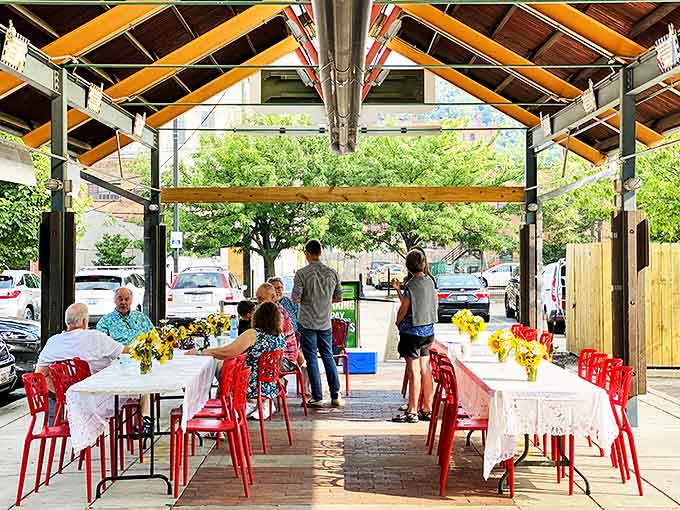 Red chairs and white tablecloths create an outdoor dining area that feels like Cincinnati's answer to European café culture, minus the cigarette smoke.