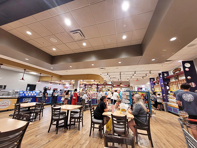The food court offers a welcome respite for hungry shoppers, where refueling becomes part of the Scheels experience rather than an interruption.