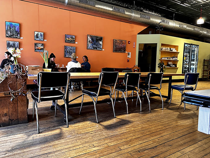 Mismatched chairs and communal tables create a welcoming space where strangers become friends over great food.