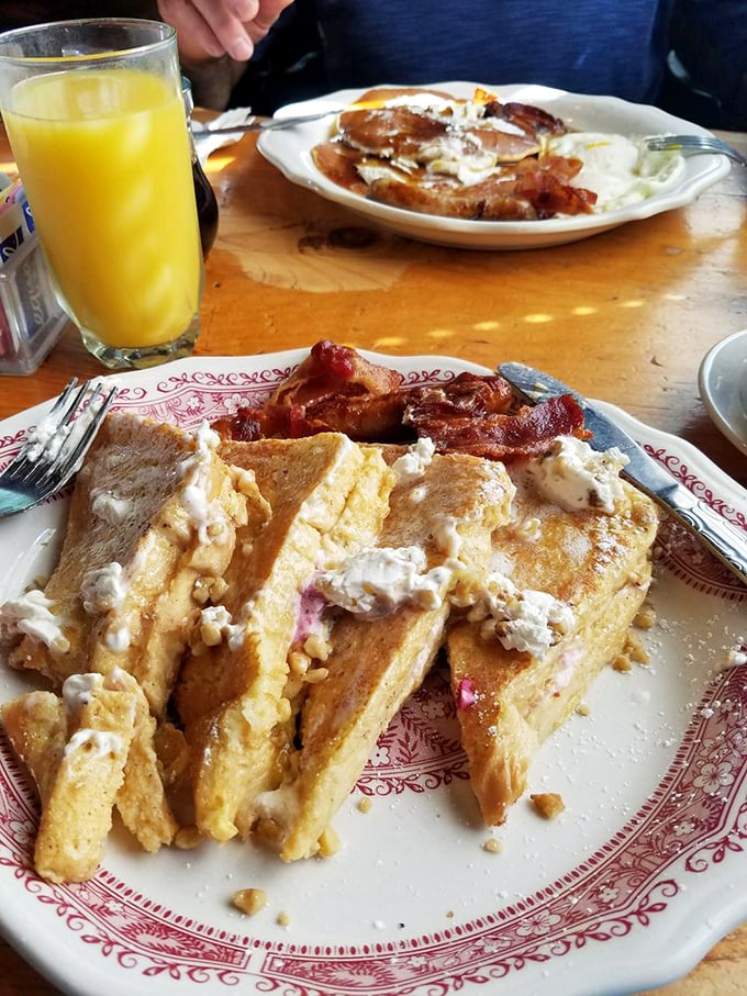 This isn't just French toast &ndash; it's a masterpiece of custardy bread, crispy edges, and maple-soaked goodness that makes hitting the snooze button seem like a crime.