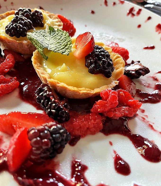 Sweet geometry: This fruit tart balances buttery crust with tangy lemon curd and fresh berries &ndash; dessert that's both sophisticated and playful.