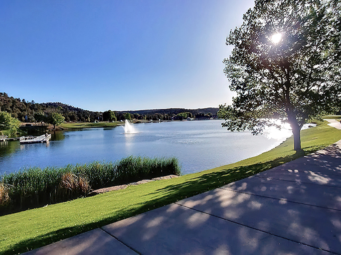 Adventurers explore the cavern's cool embrace, dwarfed by limestone walls that have witnessed the passing of civilizations with geological indifference.