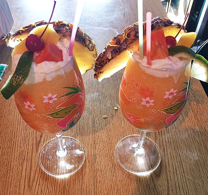 These tropical drinks bring vacation vibes to the prairie, complete with fruit garnishes that mean serious business.