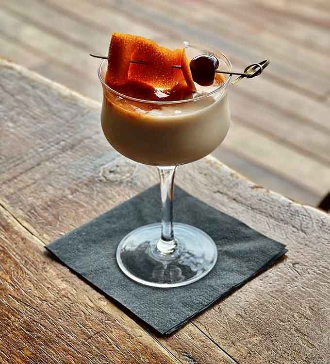 Craft cocktails here aren't just drinks—they're liquid art with a side of bacon, because Minnesota knows what's up.