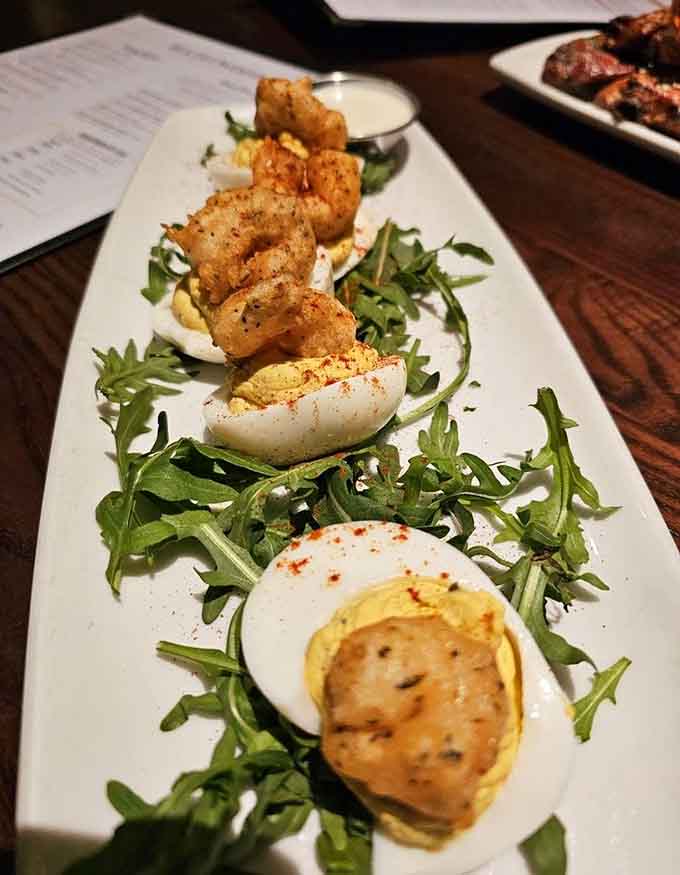 Deviled eggs elevated to an art form, proving that classic appetizers never go out of style when done right.