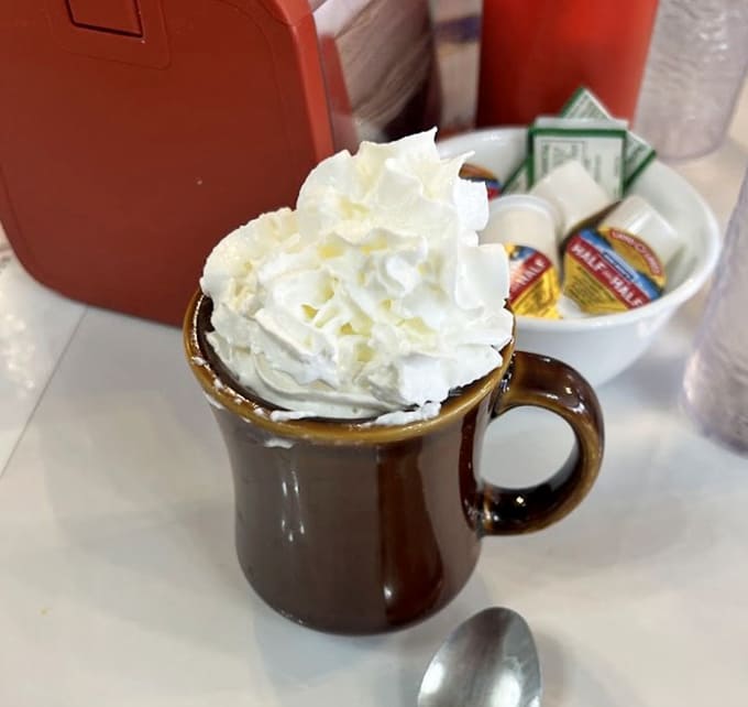 Hot chocolate topped with a whipped cream mountain, because Hoagie's doesn't believe in doing things halfway.
