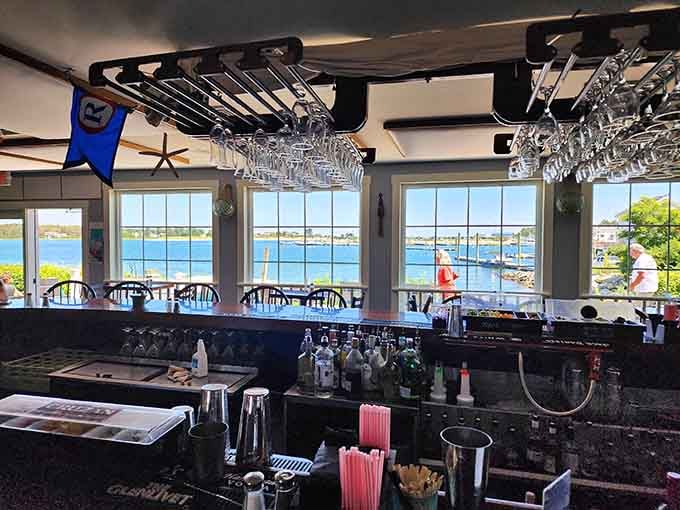 The bar area offers front-row seats to the waterfront action, perfect for solo diners or anyone who wants to watch boats while sipping something cold.