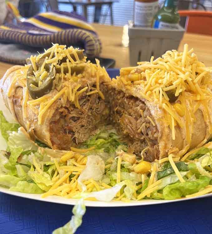 This chimichanga arrived golden and crispy, stuffed with goodness and topped with all the fixings your heart desires and your stomach demands.