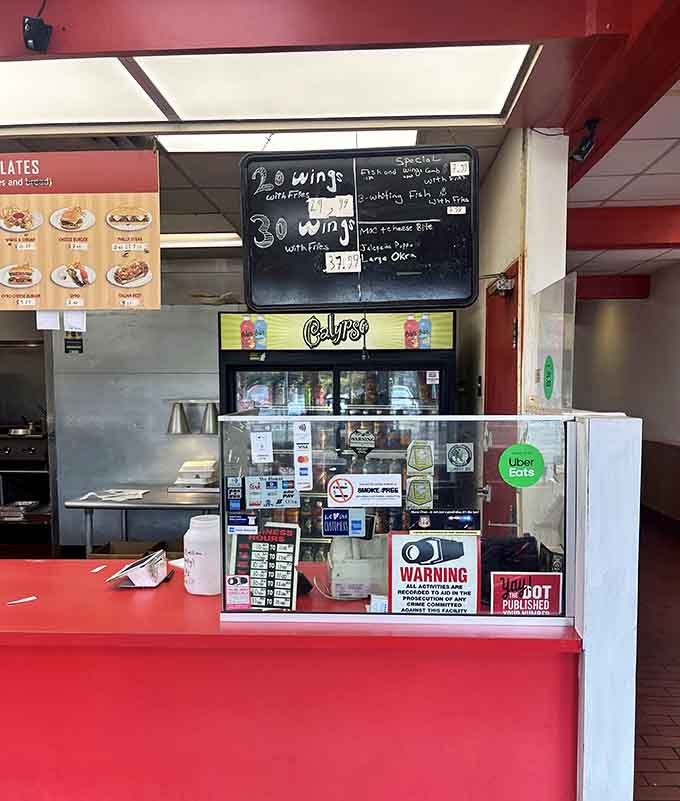 The ordering counter where dreams are spoken aloud and transformed into delicious reality by skilled hands behind the scenes.