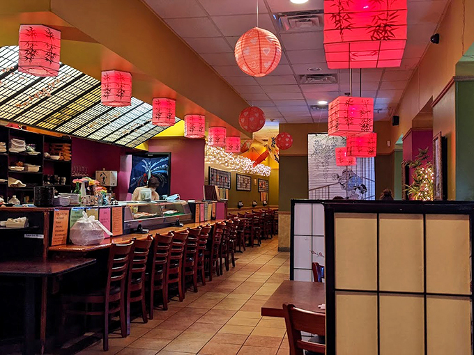 Pink paper lanterns dance overhead, creating an ambiance that makes every dinner feel like a special occasion.