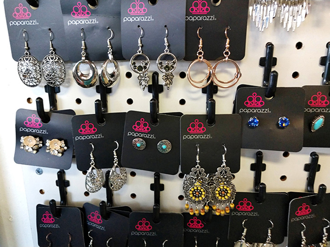 Affordable glamour dangles from this display of Paparazzi jewelry &ndash; proof that treasure hunting doesn't have to break the bank.