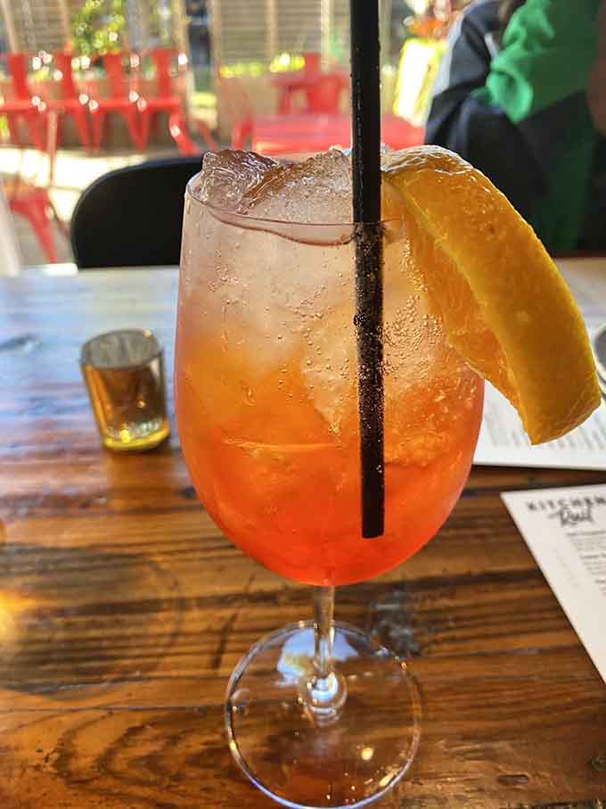 An Aperol Spritz with a generous orange slice brings a taste of Italian summer to Minnesota any season.
