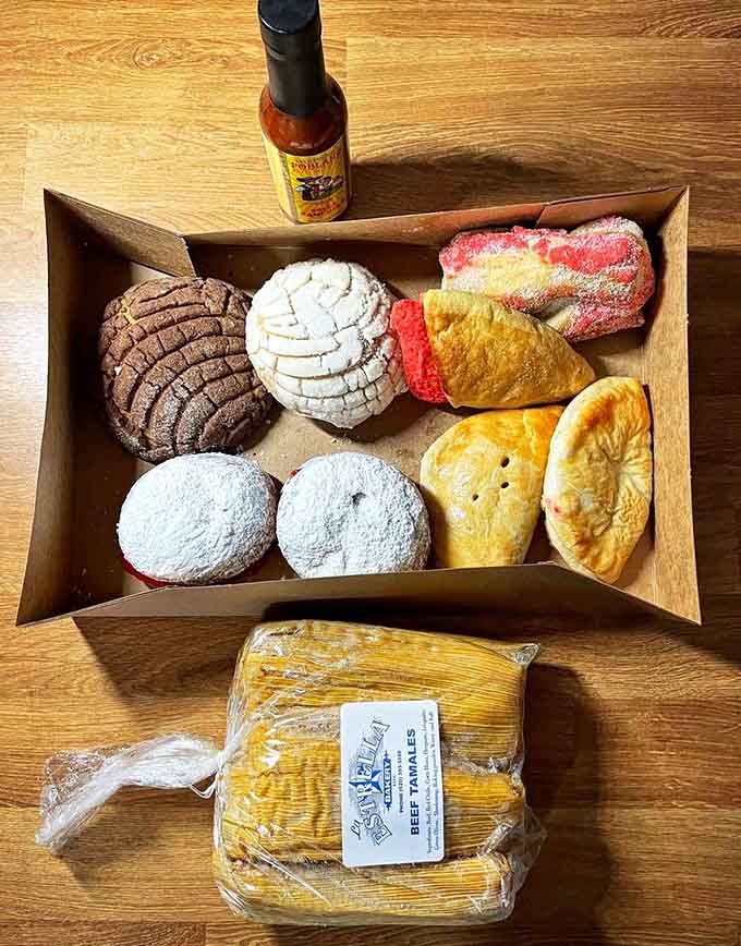 The to-go spread includes beef tamales and enough pastries to make your kitchen counter look like a bakery display case.