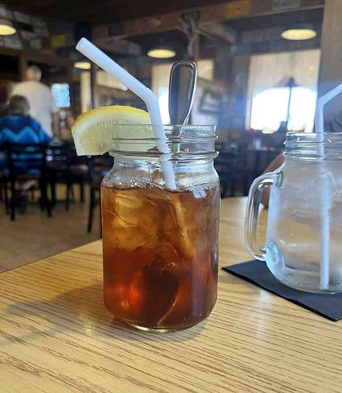 Even the iced tea comes served in a proper mason jar, because at Leff-T's, every detail contributes to that authentic Western experience.
