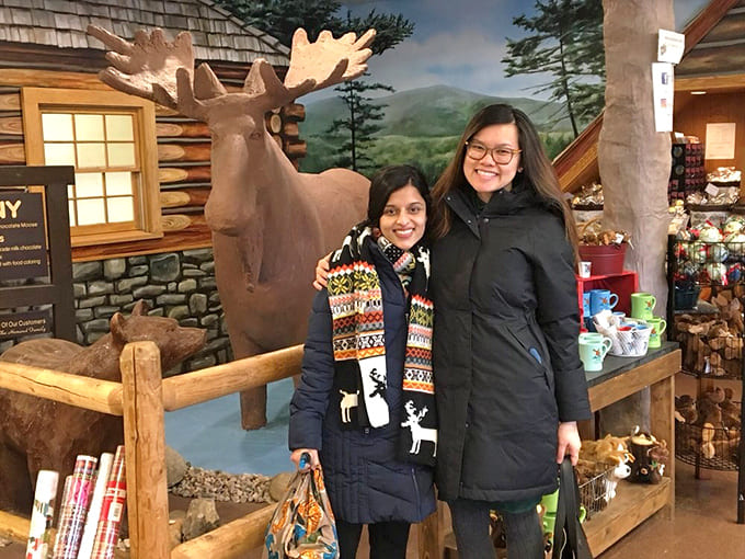 Visitors pose with their new chocolate friend, creating memories that are definitely worth the Instagram post.