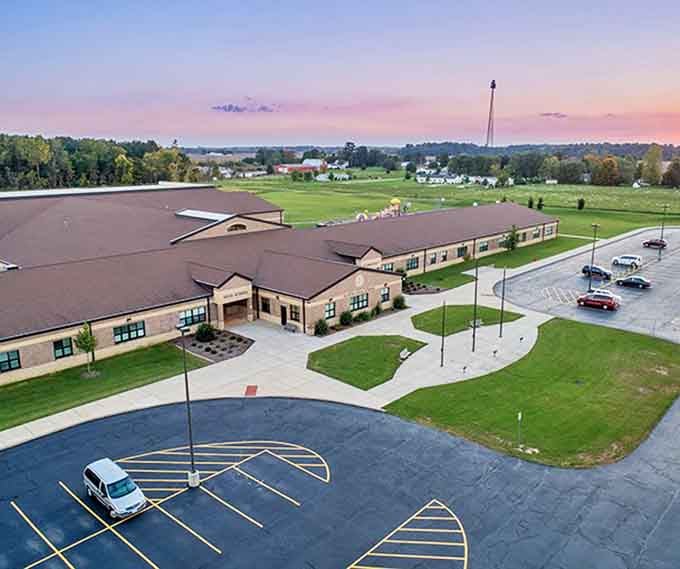Local School: More than classrooms and corridors, this building serves as Fayette's community hub where Friday night lights unite generations.
