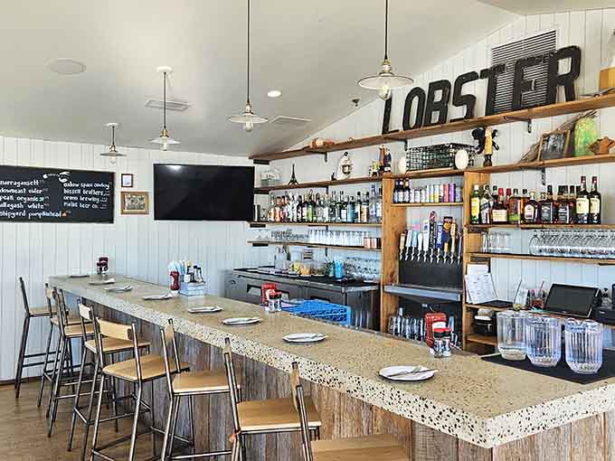 The bar area beckons with local brews and spirits, perfect for toasting to another successful day of eating your way through Maine.