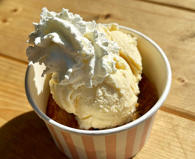 Wild Maine blueberry pie topped with whipped cream, the sweet ending your seafood feast deserves after all that buttery goodness.