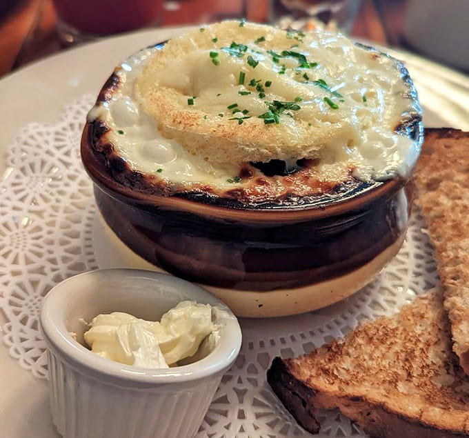 French onion soup with that gloriously melted cheese cap, the kind that stretches dramatically when you lift your spoon for Instagram.