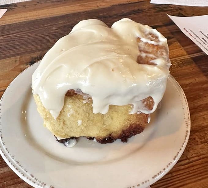 That cinnamon roll could double as a pillow, if pillows were covered in cream cheese frosting.