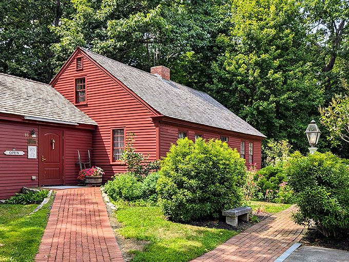 This centuries-old red cape whispers stories of maritime adventures and colonial life through its weathered clapboards and meticulous gardens.