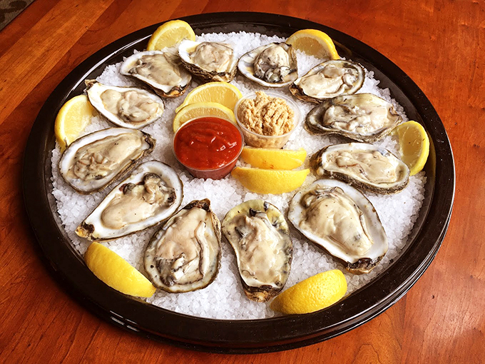 Fresh oysters on ice, looking fancy enough for a bivalve black-tie event. Pucker up for a taste of the sea! 