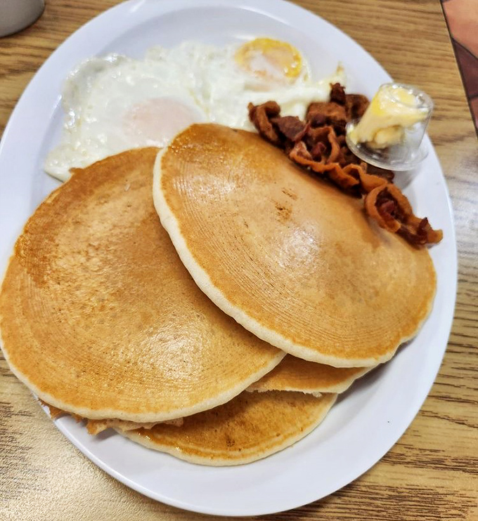 Pancake: Fluffy discs of breakfast joy dusted with powdered sugar &ndash; the kind that make you wonder why you ever bothered with fancy brunch spots.