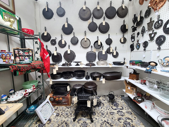 Holy kitchenware, Batman! This wall of cast iron could outfit a small army of chefs or survive a zombie apocalypse.
