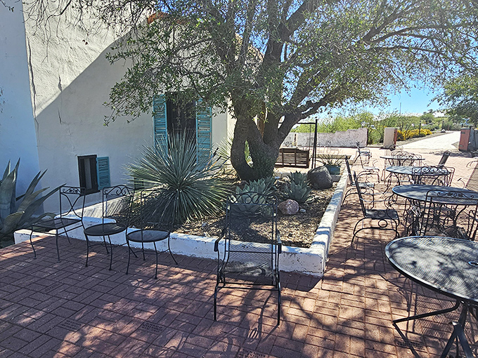 The ranch house patio invites visitors to linger over coffee while contemplating the sweeping views &ndash; desert dining at its finest.