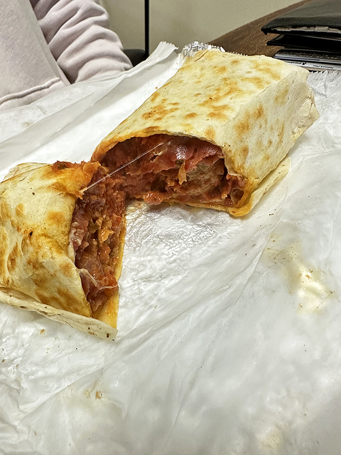 Wrapped in warm flatbread, this chili burger creation proves that thinking outside the bun leads to delicious innovation.