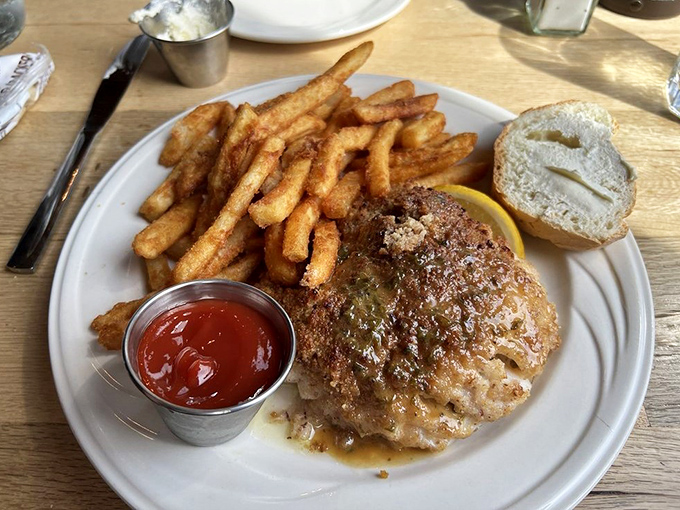 Beyond the famous mac and cheese, DiMillo's pecan-crusted haddock showcases the restaurant's commitment to fresh, perfectly prepared Maine seafood.