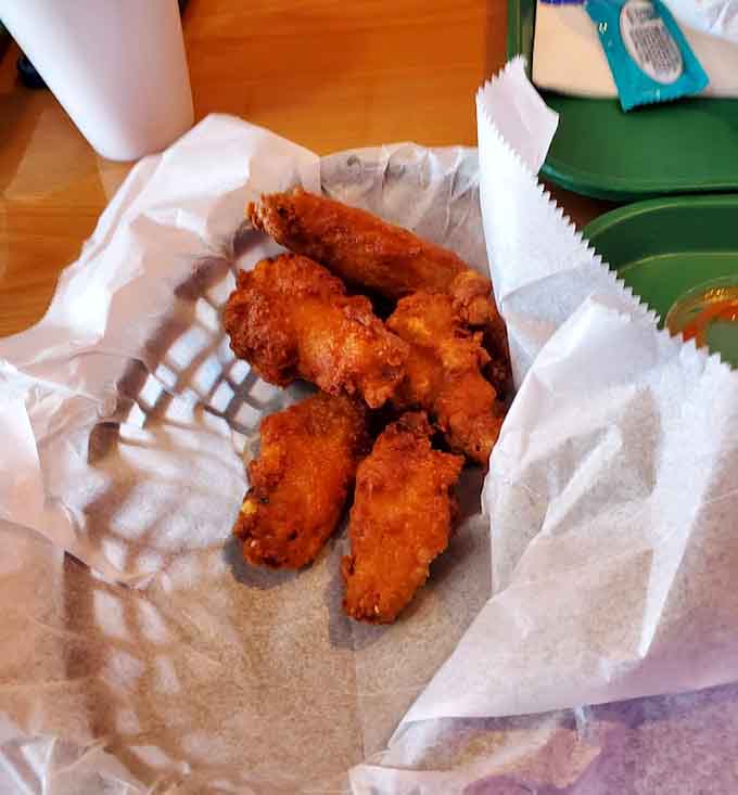 Golden fried chicken wings that deliver crispy skin and tender meat in every finger-licking bite.