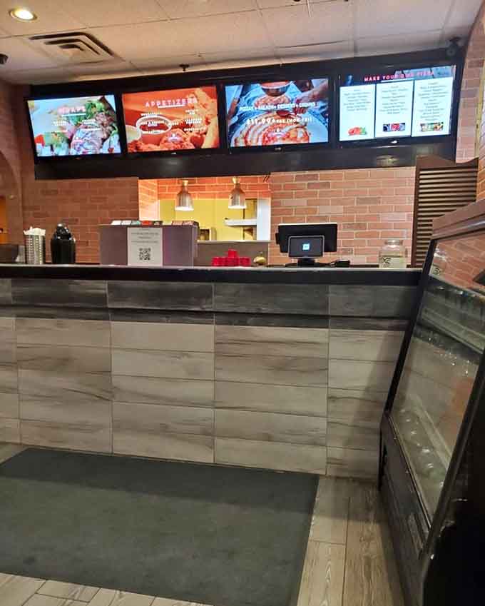 The ordering counter features digital menu boards that actually help rather than confuse, a rarity in modern restaurant design.