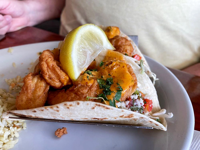 These popcorn shrimp tacos bring together crispy, tender bites wrapped in soft tortillas &ndash; proof that good things come in small, handheld packages.