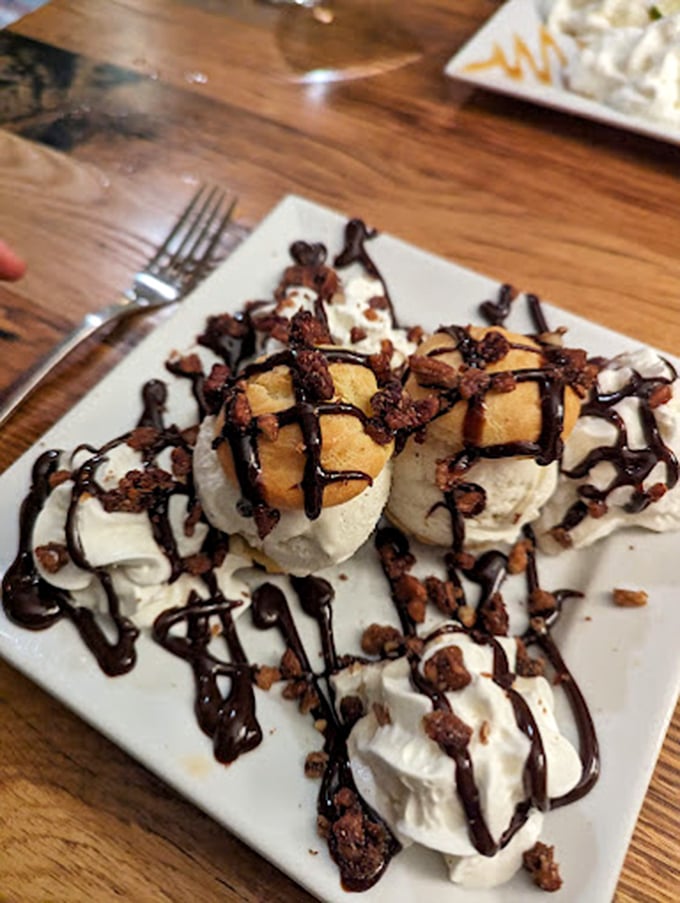 A dessert that looks like it graduated from pastry school with honors&mdash;cream puffs dressed in their chocolate Sunday best.