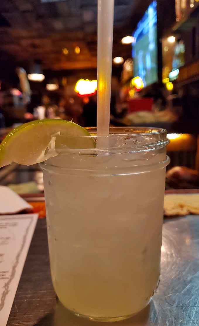 A perfectly frosty margarita with a lime wedge: the ideal companion for spicy Southwestern flavors and desert views.