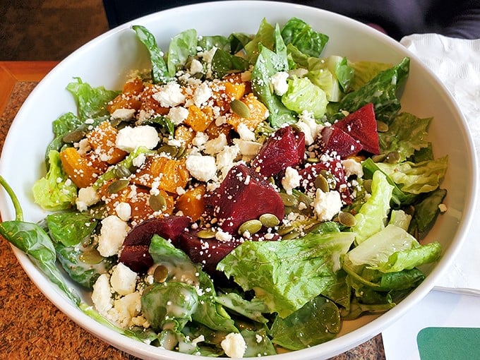 A vibrant salad that brings fresh crunch and color to the table, proving comfort food doesn't always have to be beige to be beautiful.