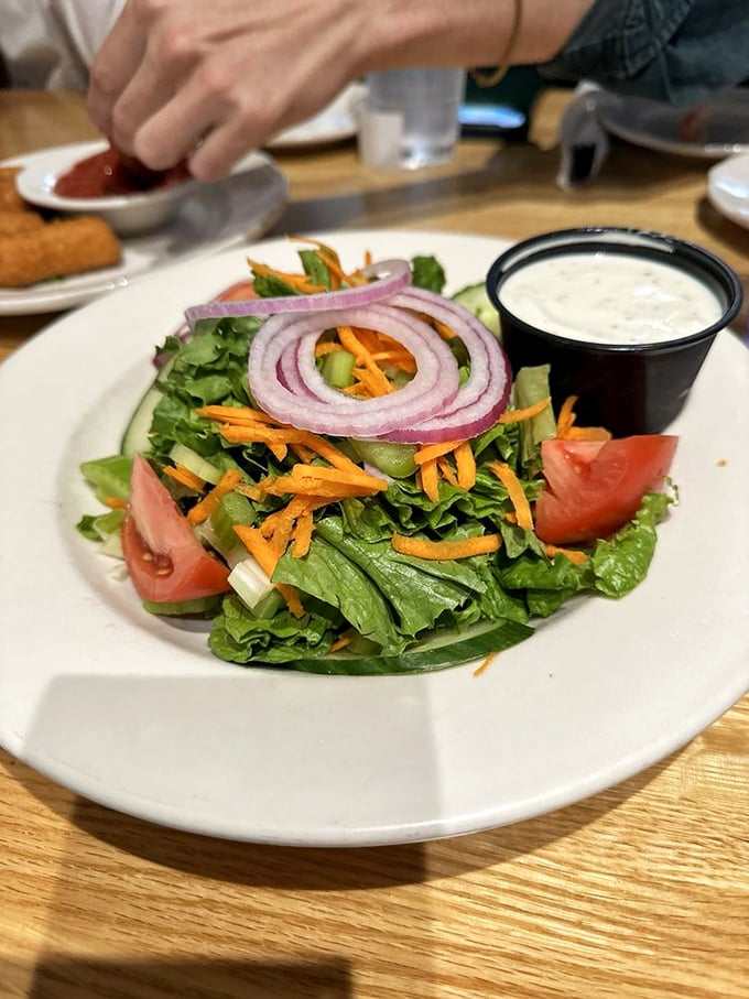 Even the salad looks like it's on vacation here. It's a burst of color that'll make you forget you're eating something healthy.